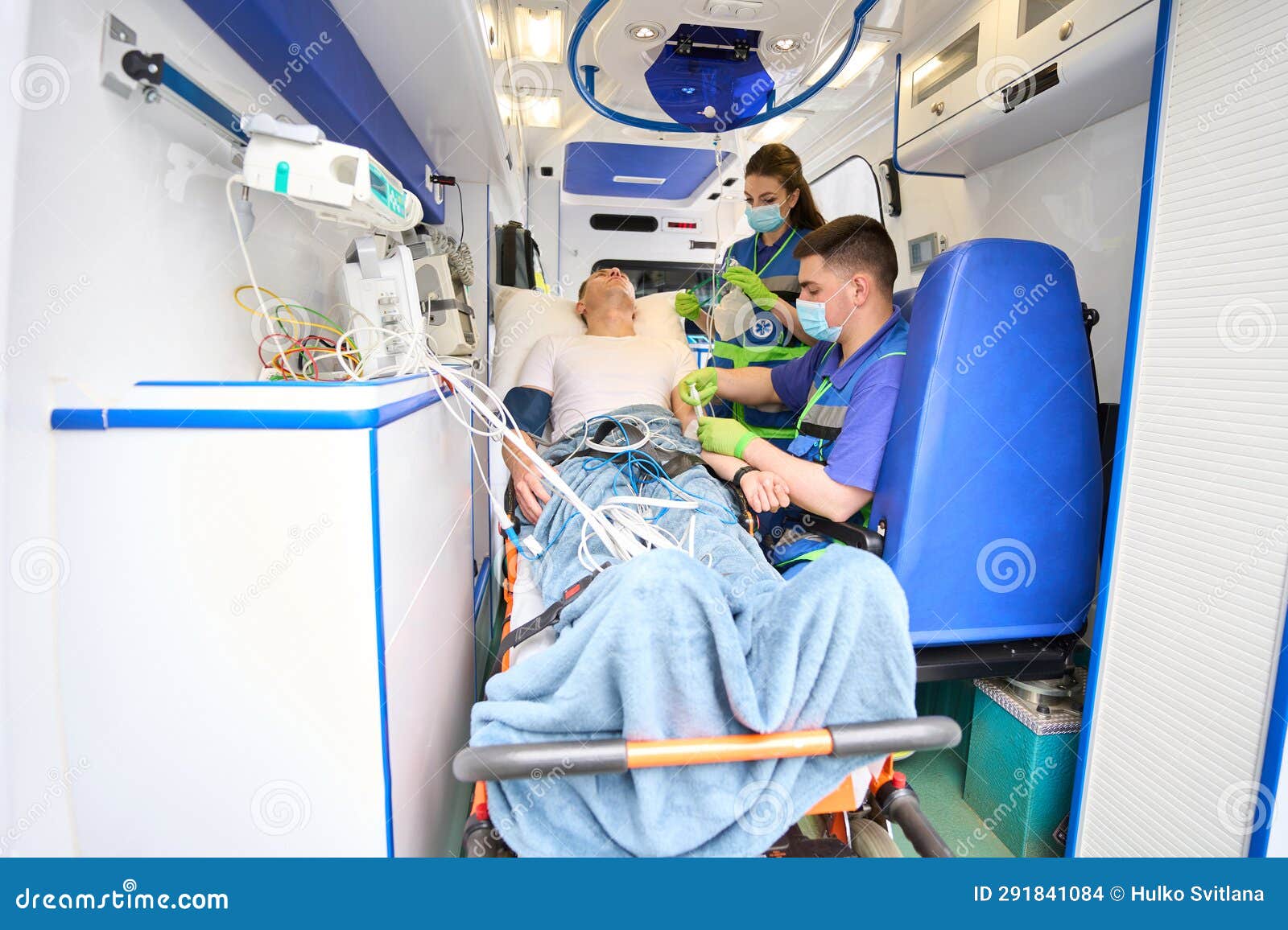 Mobile Team of Paramedics Connects the Patient To the Drip Stock Photo ...