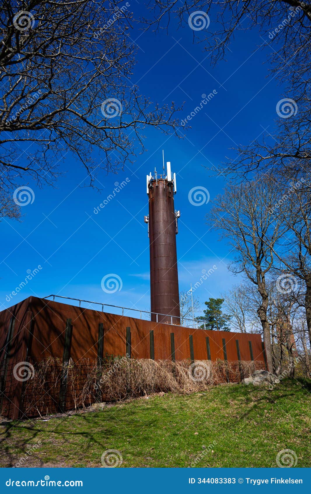 Mobile Telephone Base Tower and District Heating Funnel.. Stock Image ...
