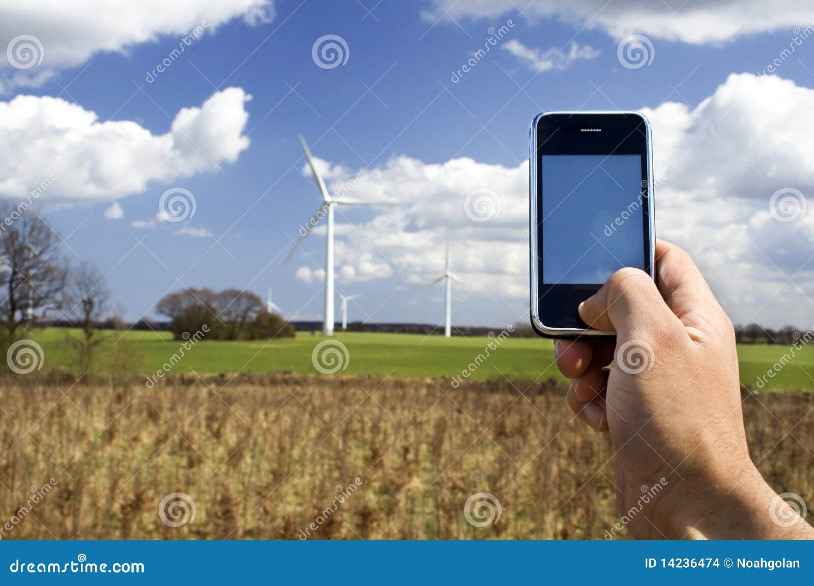 Hand Holding Mobile Phone Wind Turbines Background Stock Photos - Free ...