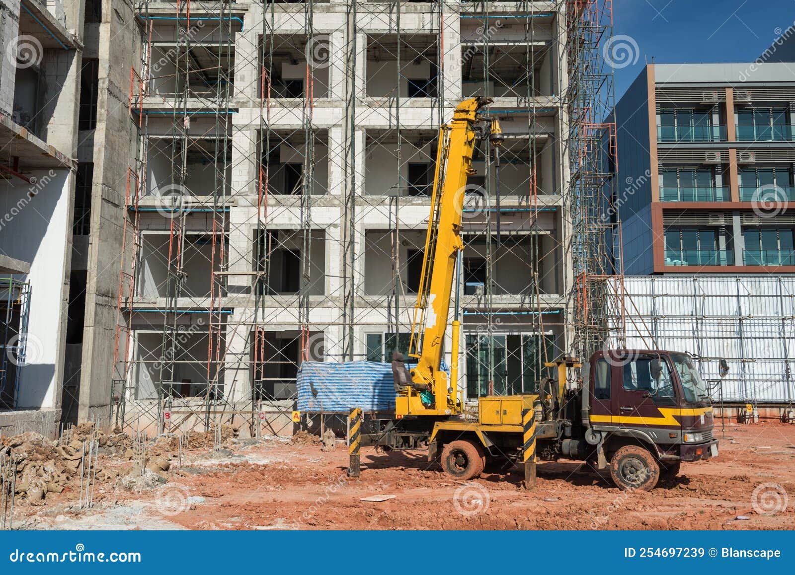 Mobile Truck with Tower Crane for Pouring Concrete at Site Stock Image ...