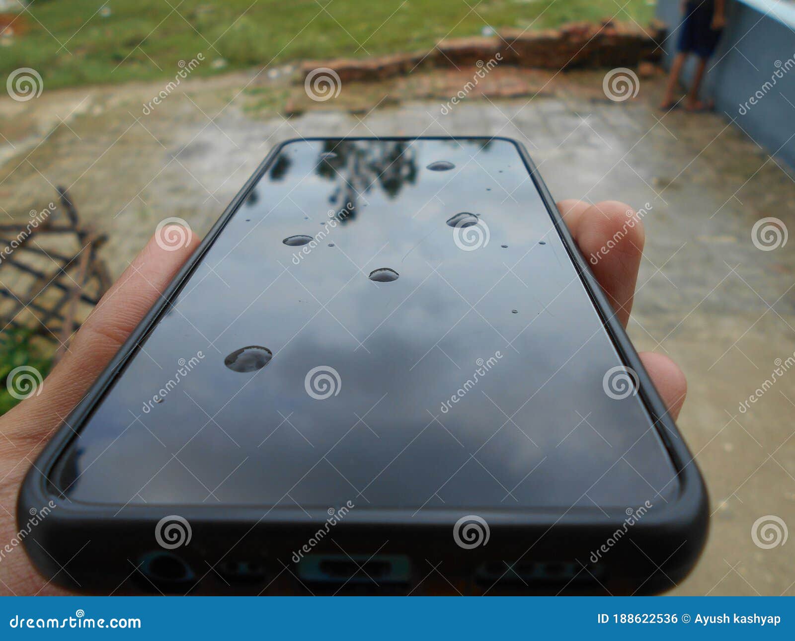 Mobile Water Drops by Digital Camera Stock Photo - Image of water ...