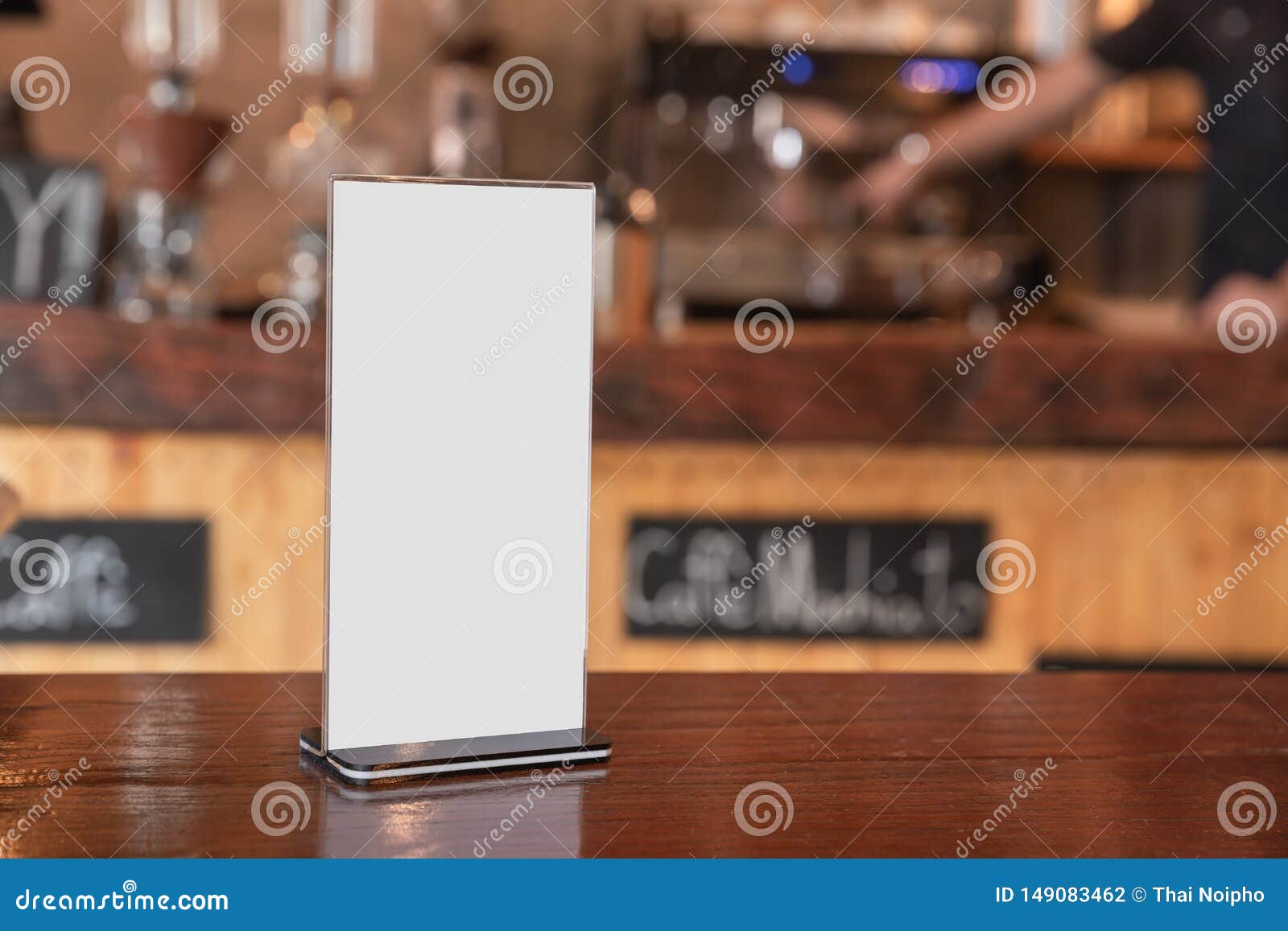 Mock Up Menu Frame Standing on Wood Table in Coffee Shop. Stock Photo ...
