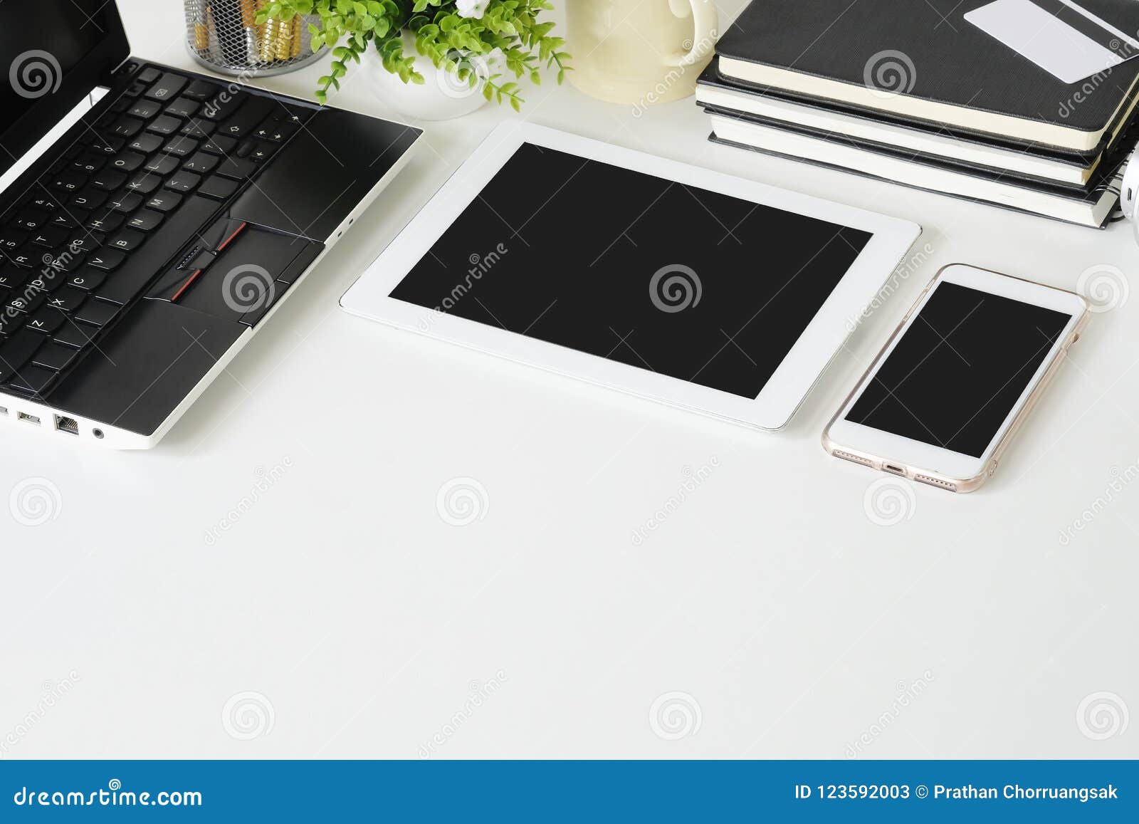 Mock Up Smartphone and Tablet with Laptop Computer on Workspace Stock ...