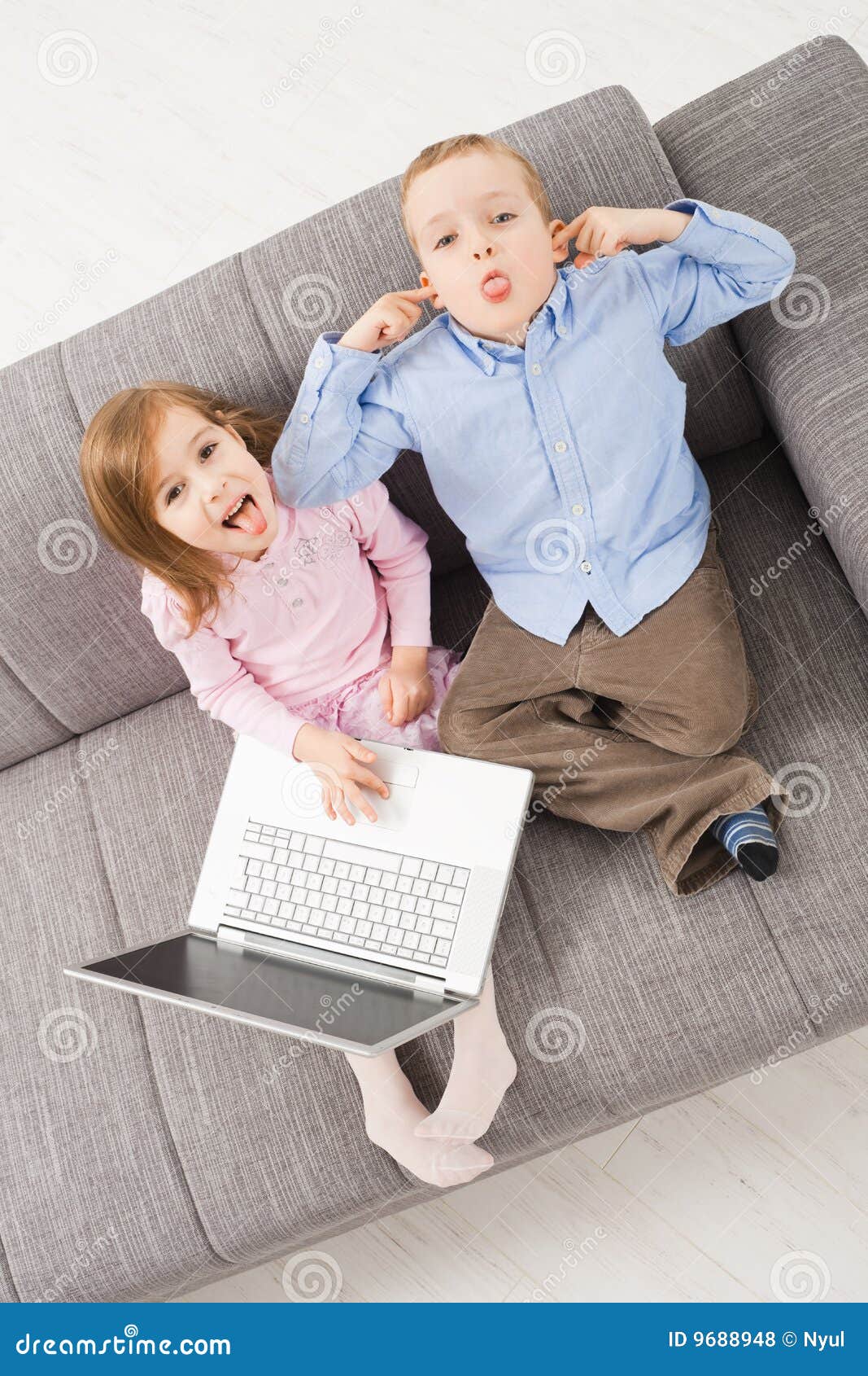 Mocking Children with Laptop Stock Photo - Image of domestic, girl: 9688948
