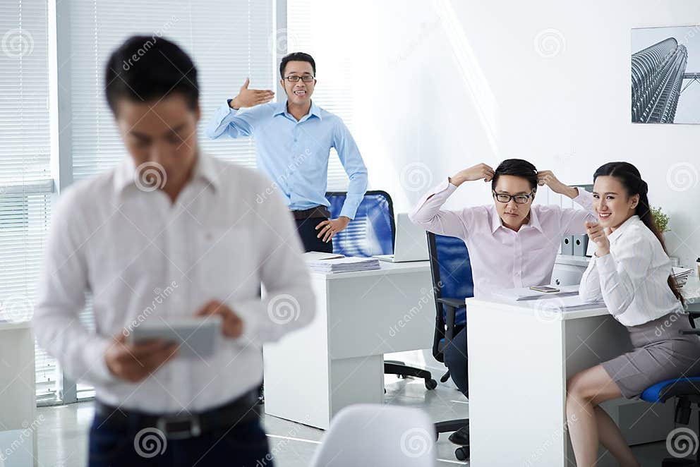 Mocking at colleague stock image. Image of working, personnel - 66388431