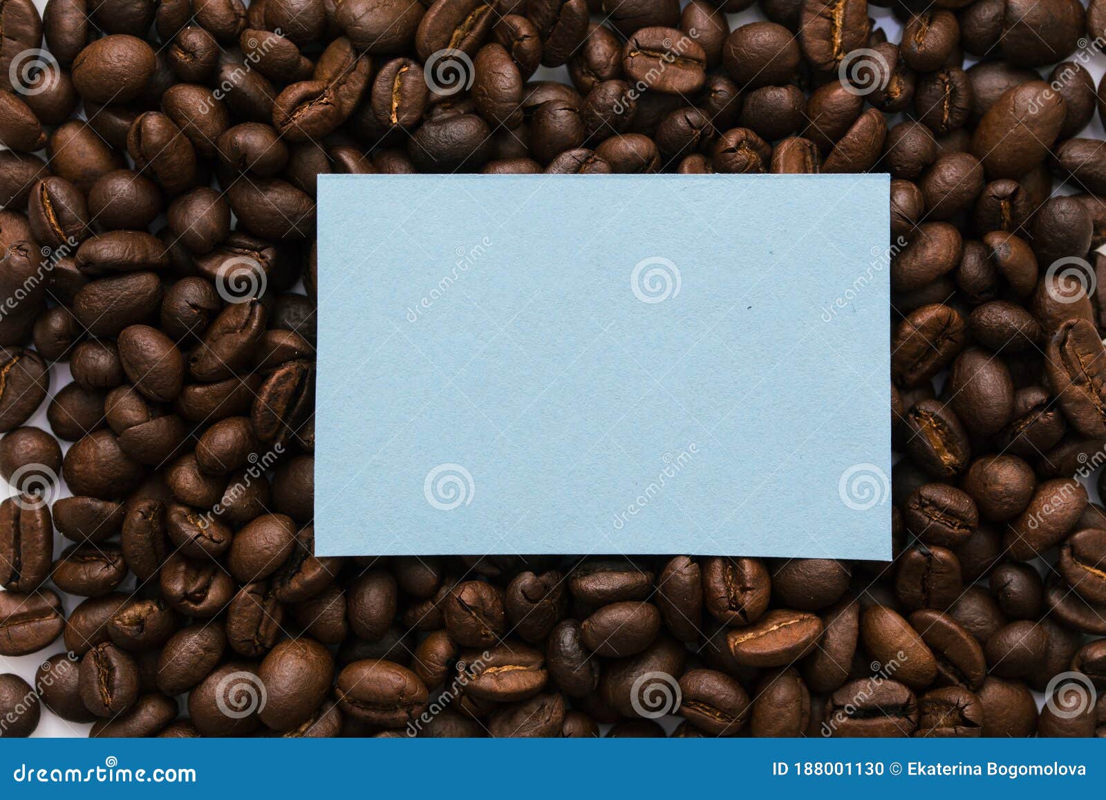 Mockup of a Blue Note on a Solid Background of Coffee Beans Stock Photo ...