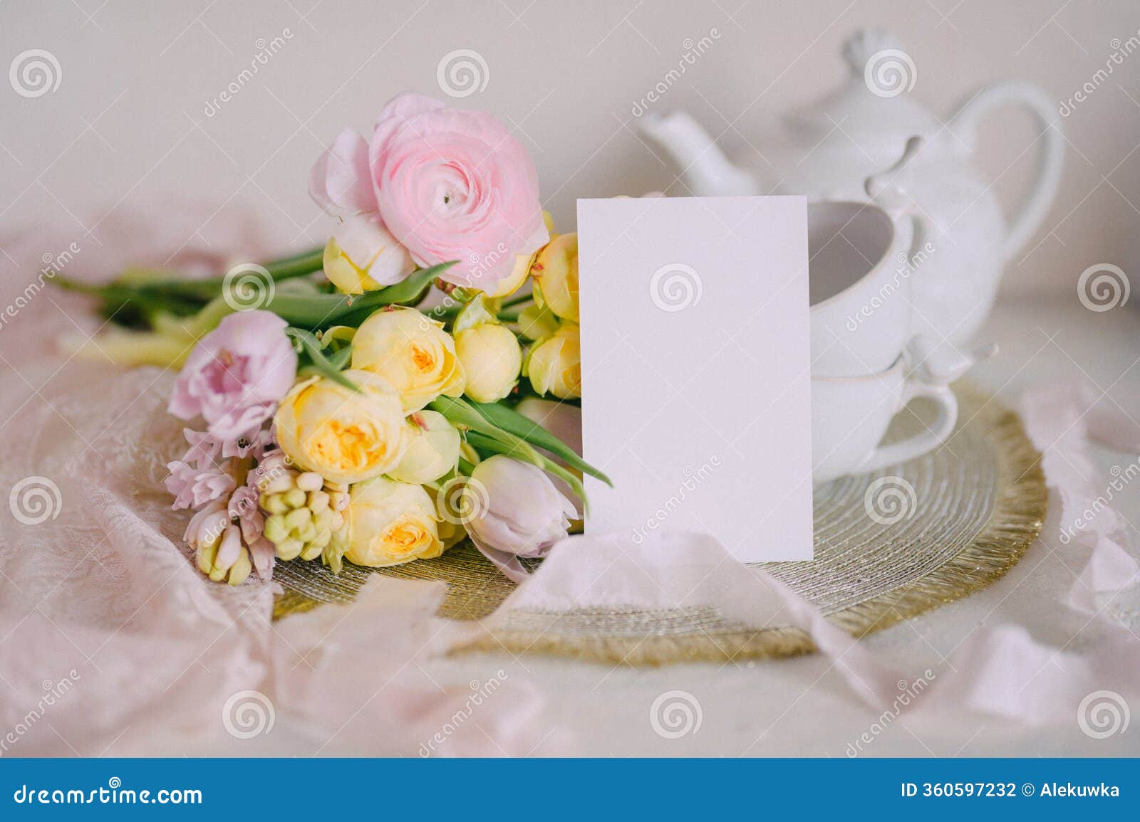 Mockup Card on Soft Spring Table Setting with Pastel Flowers Stock ...