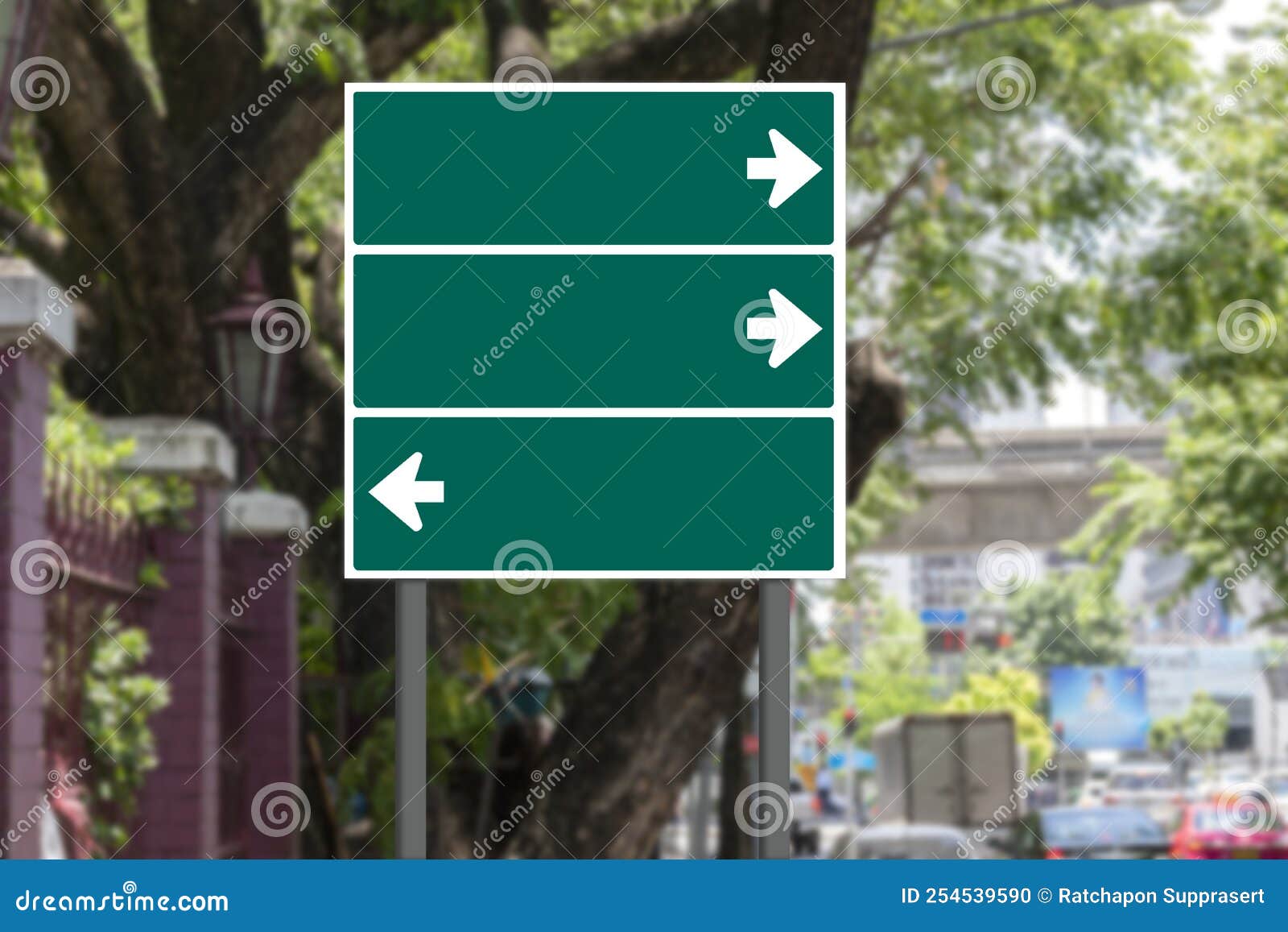 Mockup Green Road Sign with White Arrow on Footpath Stock Photo - Image ...