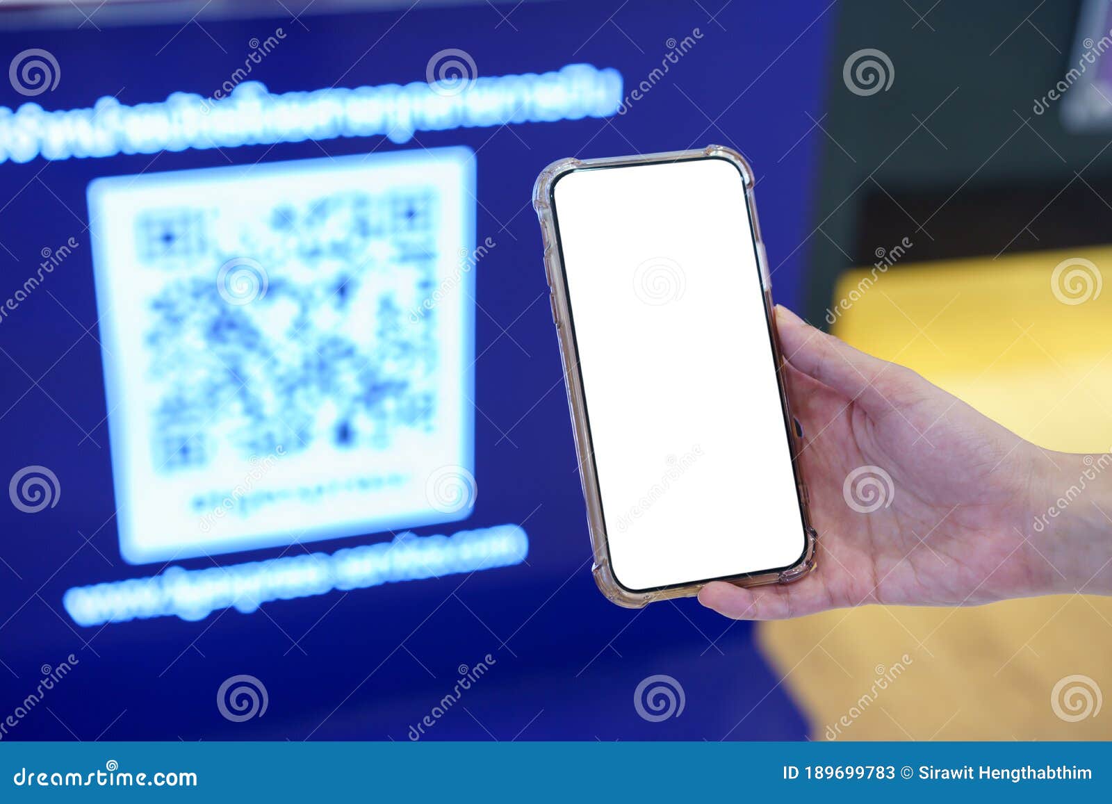 Mockup, Hands Holding Blank White Screen Mobile Phone in Blurred QR ...