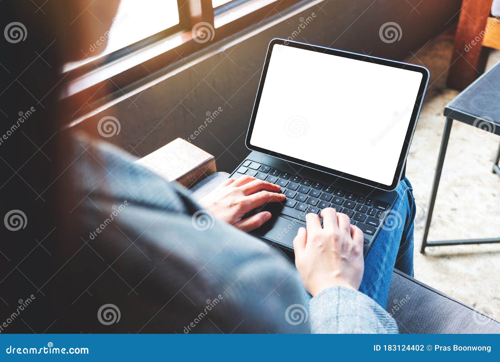 A Woman Using and Typing on Tablet Keyboard with Blank White Desktop ...