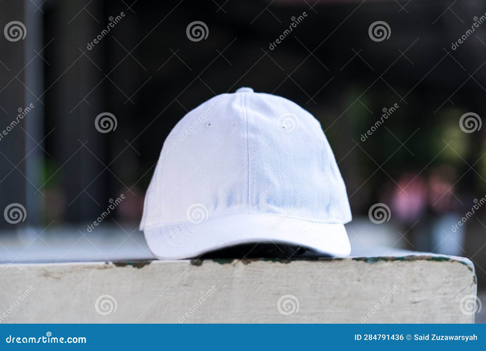 The Mockup Portrays A White Blank Hat, Elegantly Arranged With A Simple ...
