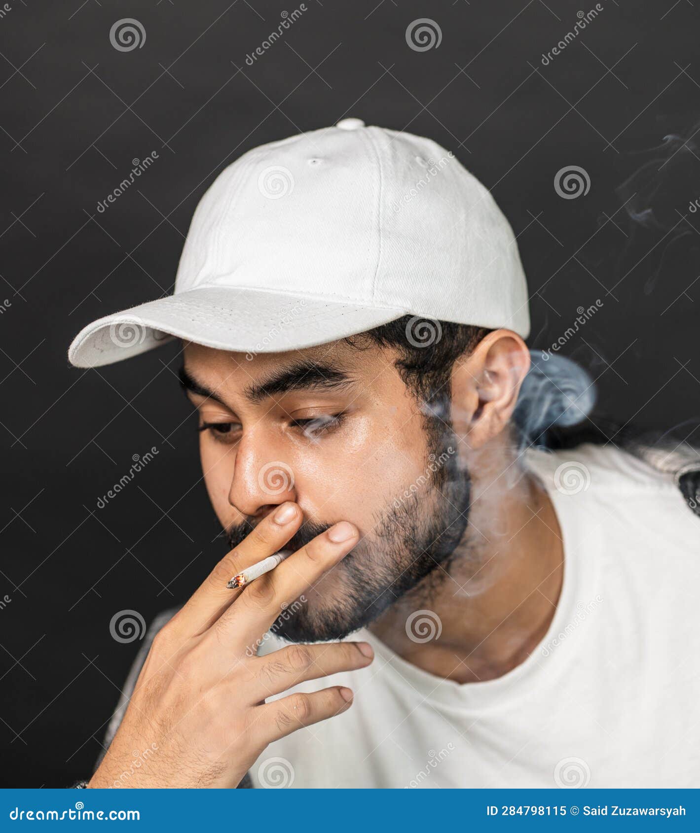 The Mockup Showcases a Man in a White Hat, Artfully Posed, Making it ...