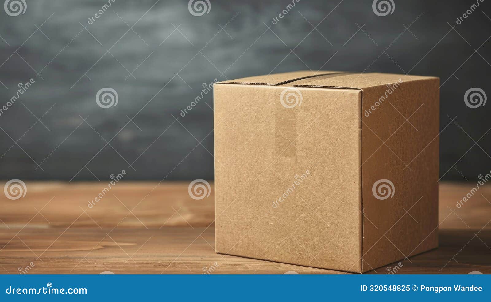 A Mockup of a Simple, Brown Cardboard Box Sitting on a Light Colored ...