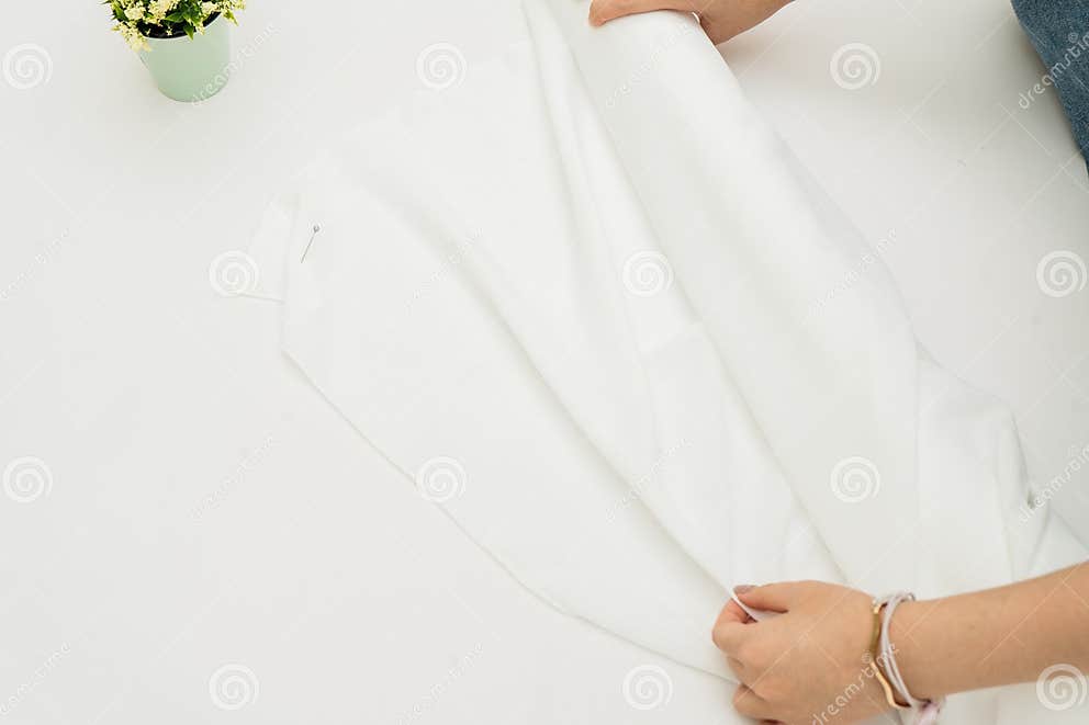 In a Serene and Stylish Minimalistic Environment, the White Fabric Roll ...