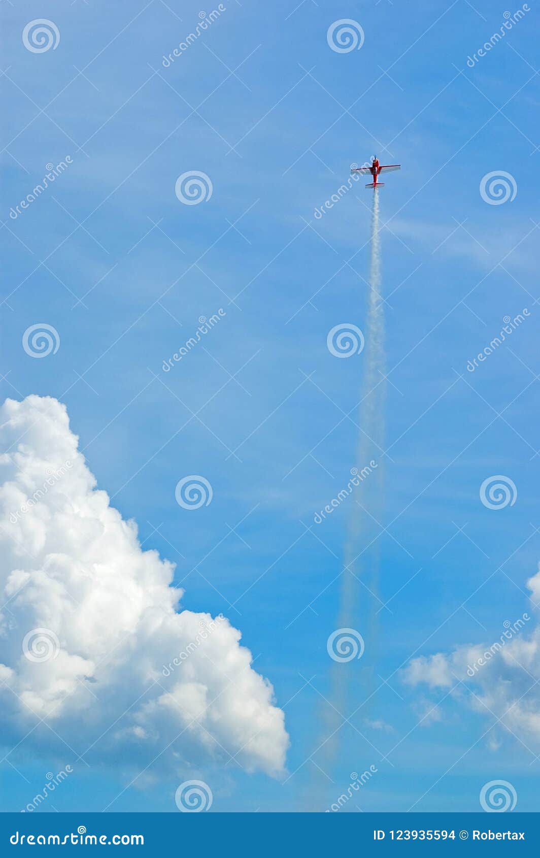 Model of Acrobatic Airplane Vertically Climbing Over Clouds Stock Photo ...