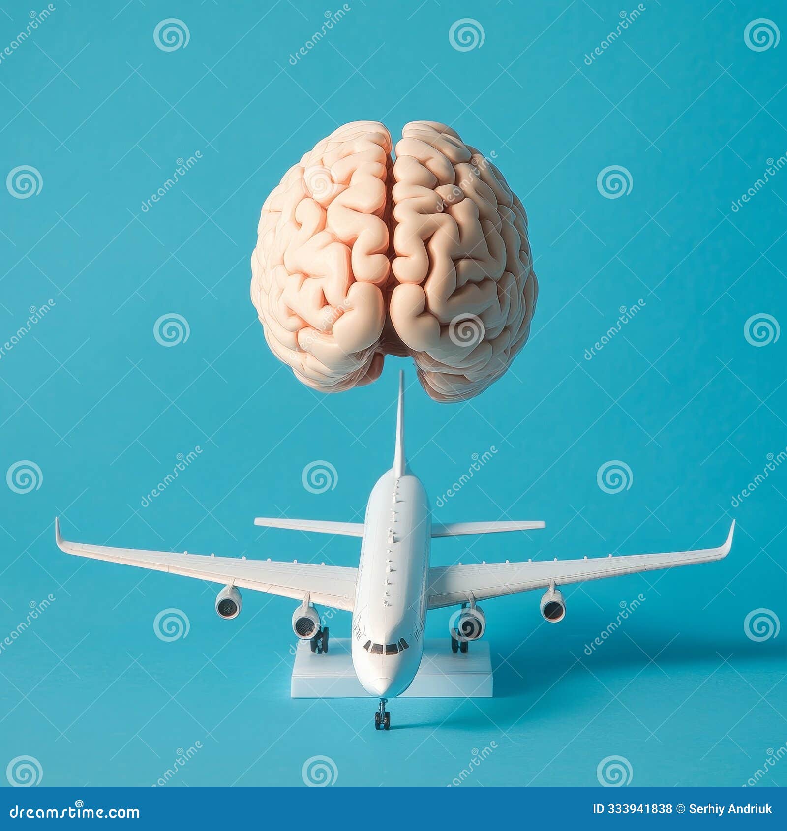 Model of an Airplane and Brain on a Blue Background. Travel Concept ...
