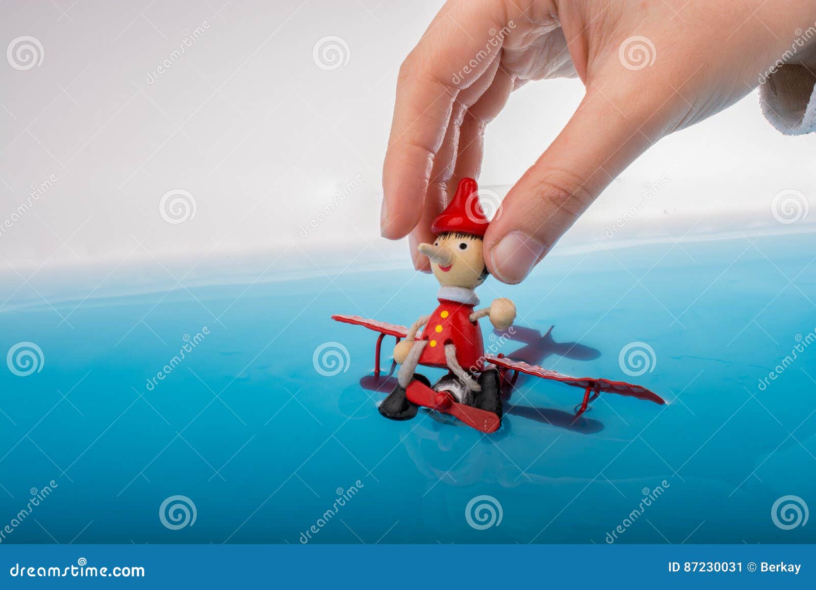Model Airplane and Pinocchio in Water Stock Image - Image of swim, liar ...