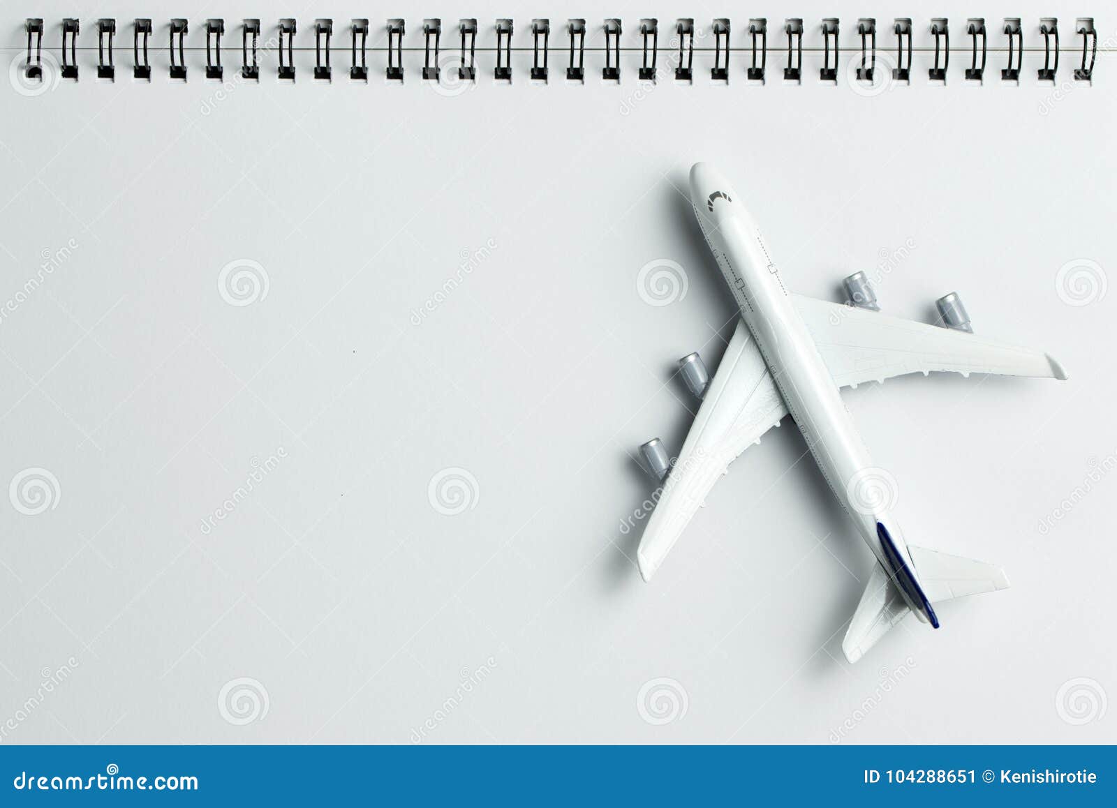 Model Airplane on Spiral Binding Notepad Stock Image - Image of ...