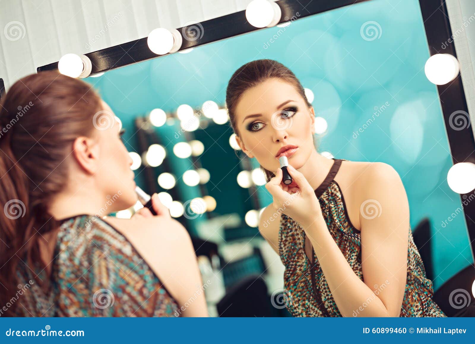Model applying lipstick stock photo. Image of care, fashion - 60899460