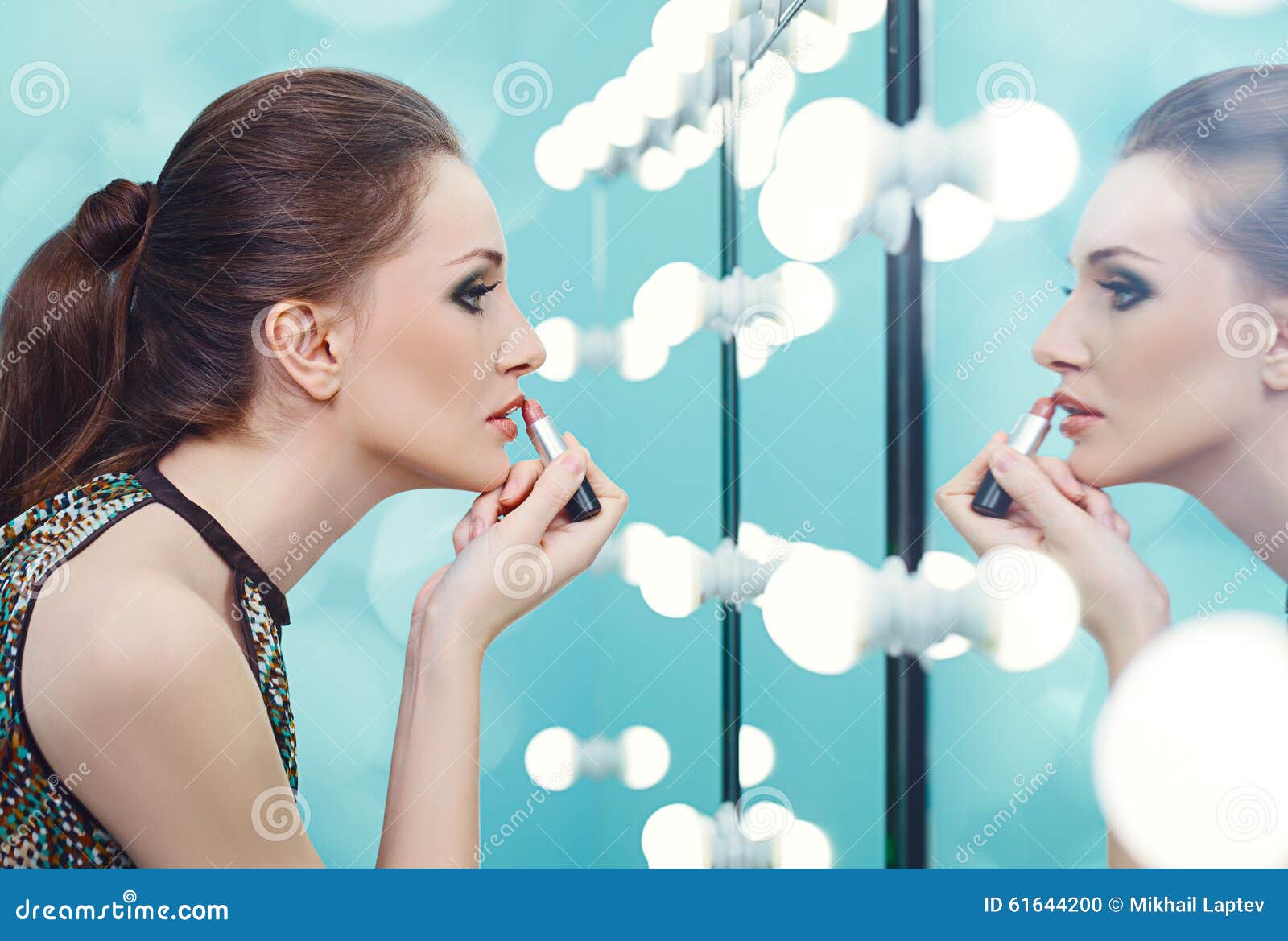 Model applying lipstick stock photo. Image of caucasian - 61644200