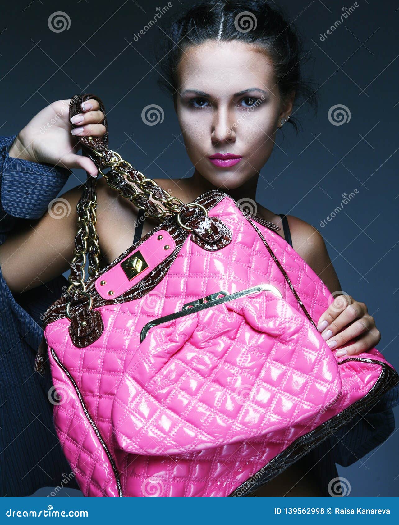Model with Bag. Posing in the Studio Stock Photo - Image of brown ...