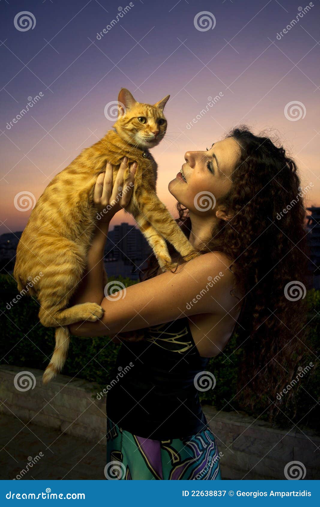 The model and the cat stock image. Image of curly, dress - 22638837