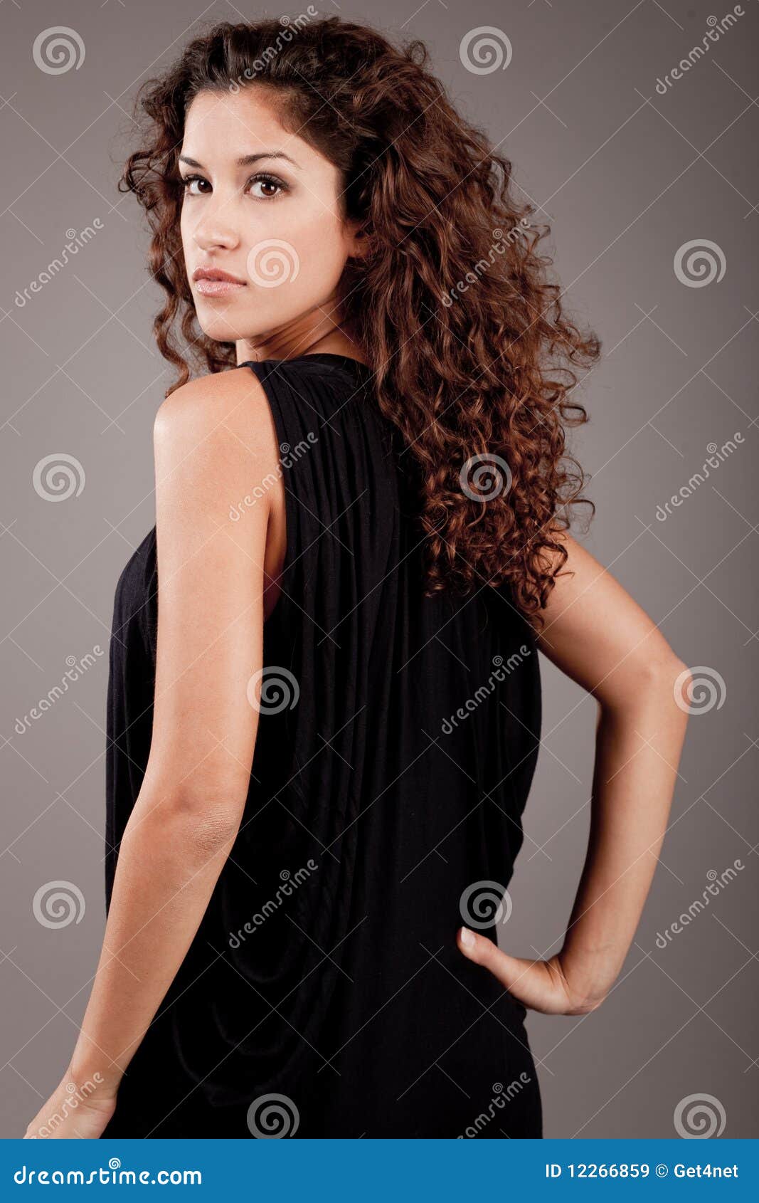 Model with Curly Hair Giving a Shot To Camera Stock Image - Image of ...