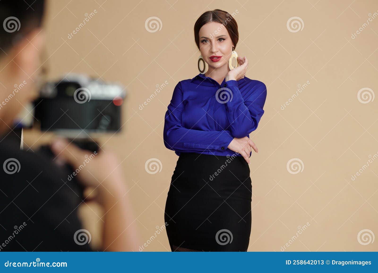 Model Demonstrating Accessory To Camera Stock Image - Image of brunette ...