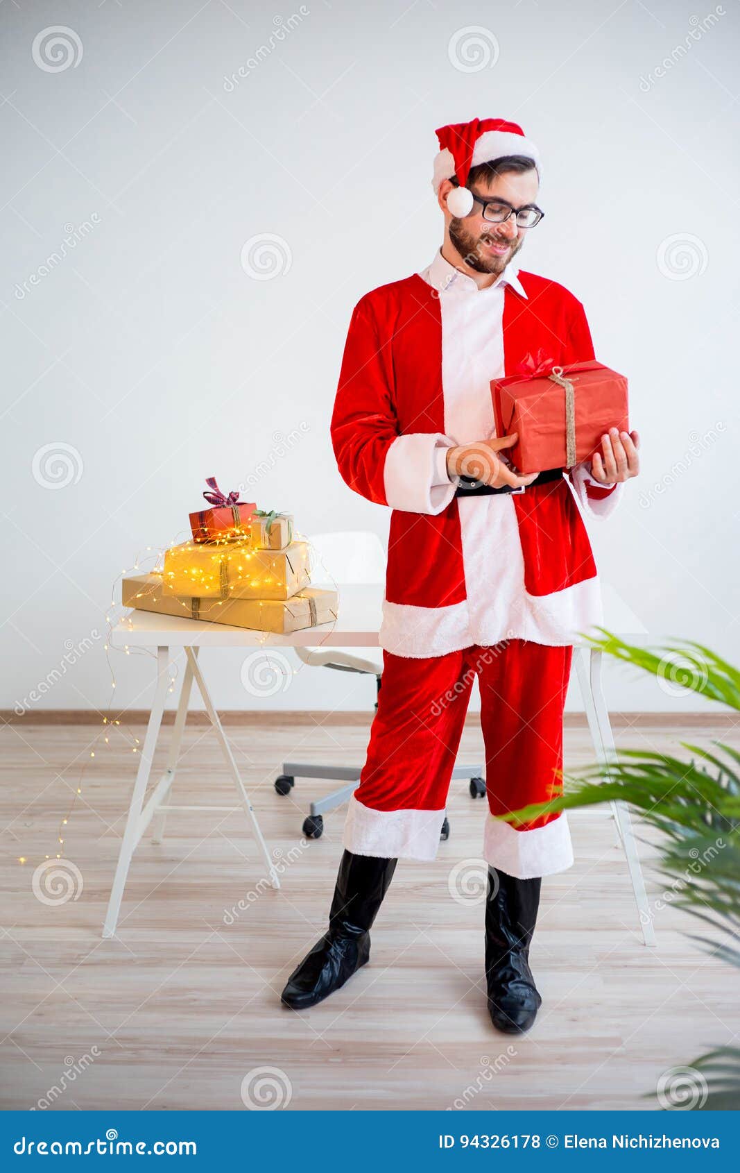 Model Dressed As Santa Claus Stock Photo - Image of saint, presents ...