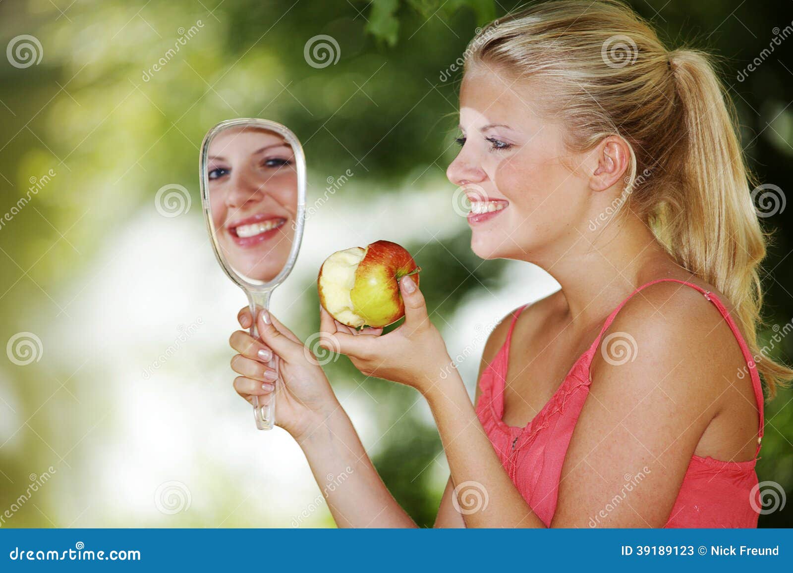Model eating an apple stock image. Image of hair, adult - 39189123