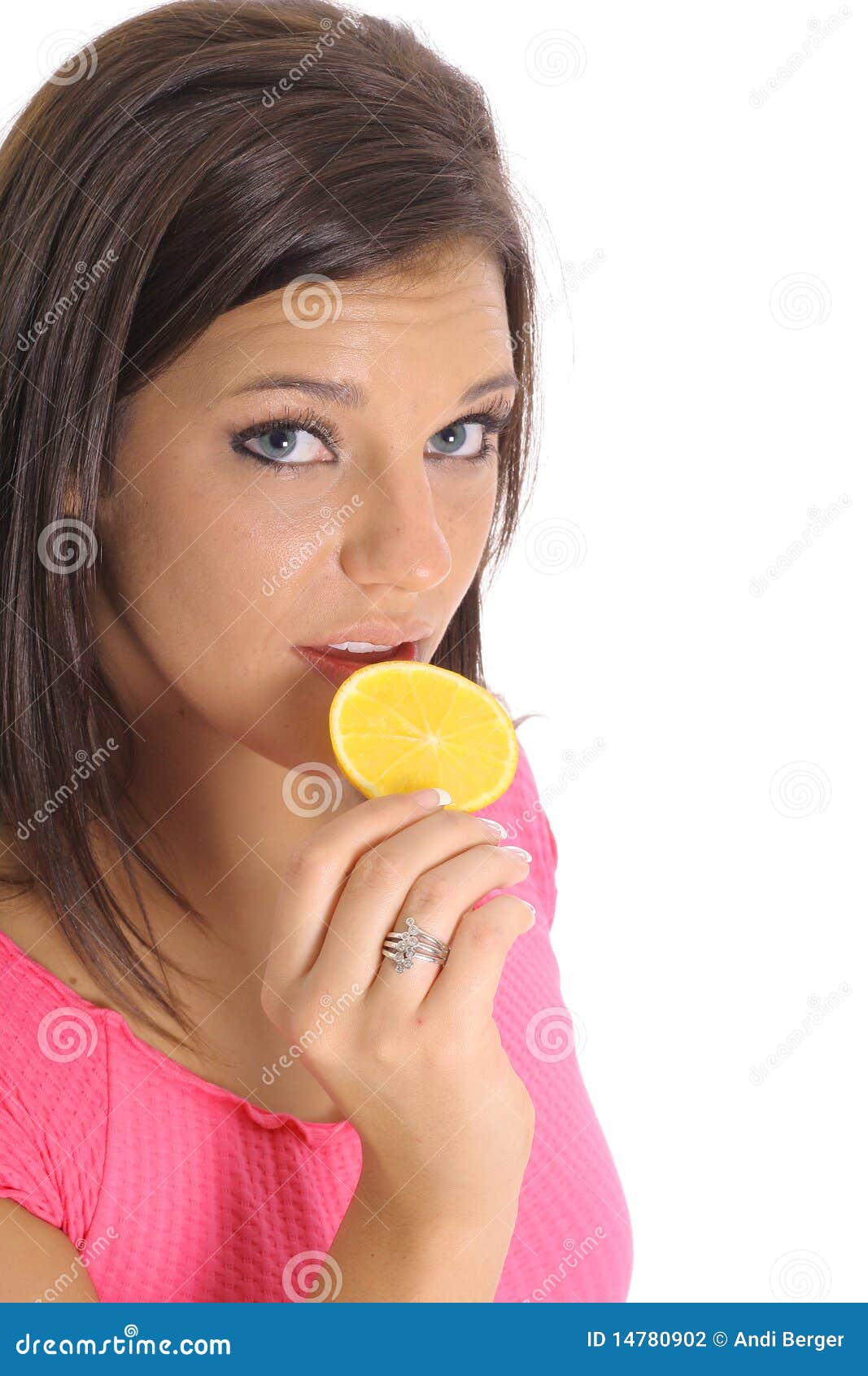 Model Eating an Orange Slice Stock Photo - Image of mexican, food: 14780902