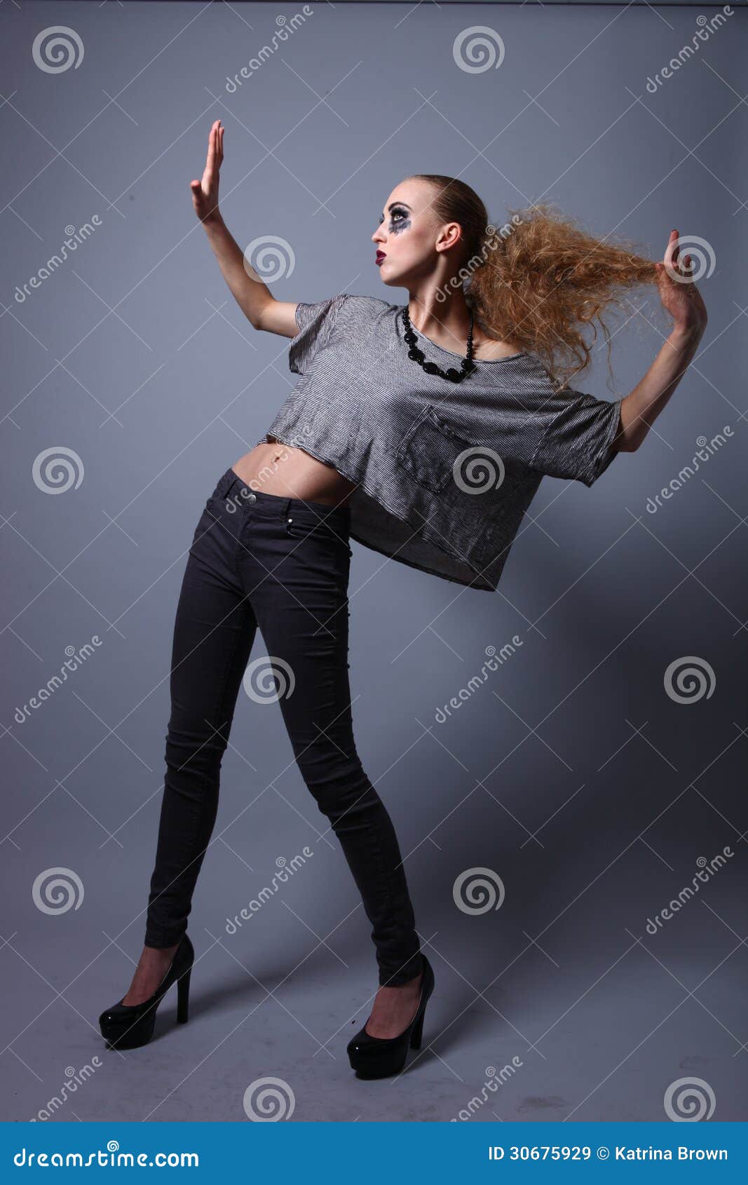 Model with Extreme Make Up in Studio Stock Image - Image of heels, hand ...