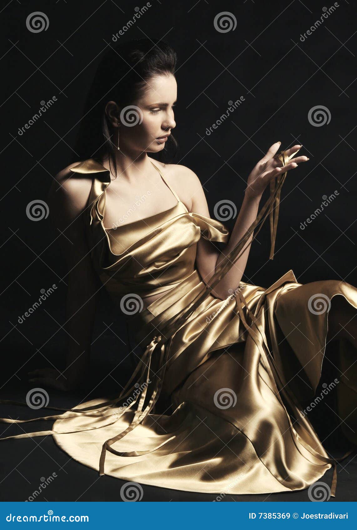 Model gold dress stock image. Image of black, brunei, clothing - 7385369