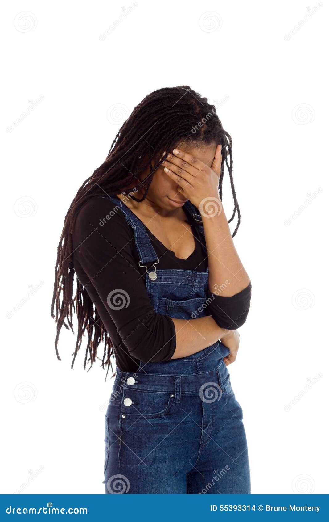 Model hiding face shame stock photo. Image of jeans, african - 55393314