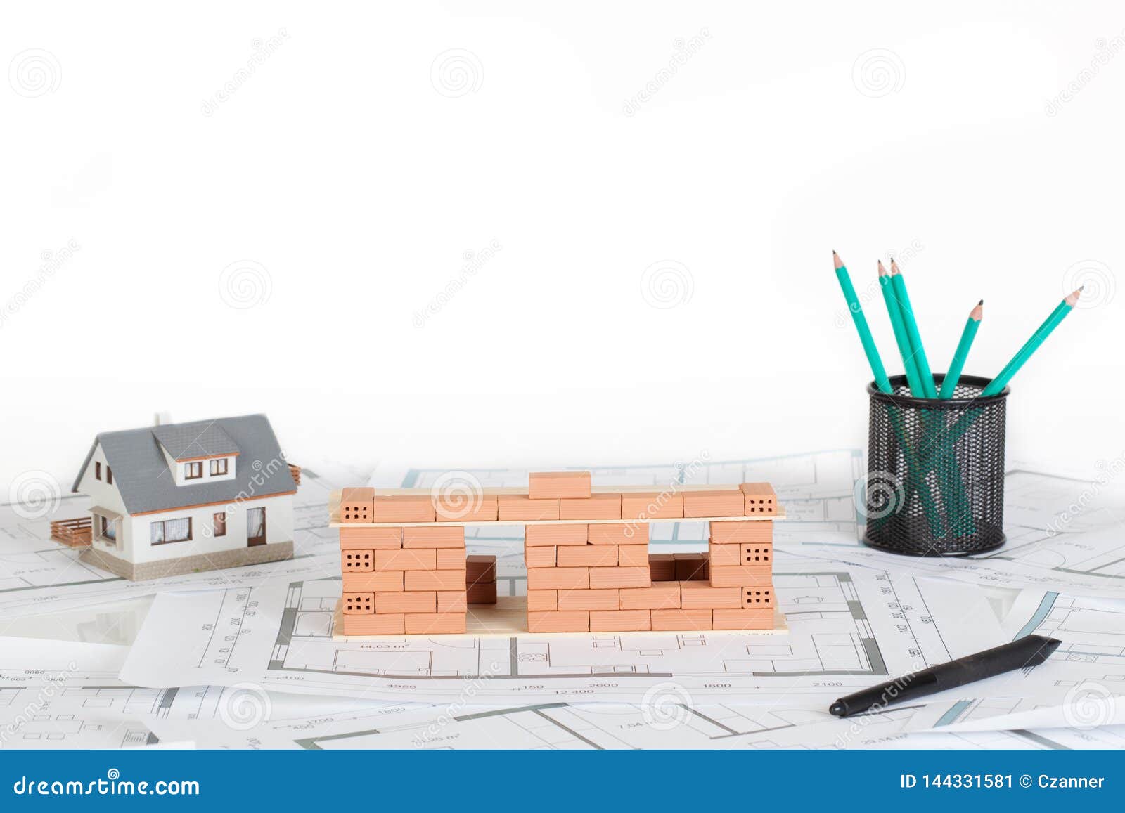 Model House Construction with Brick on Blueprint. Stock Image - Image ...