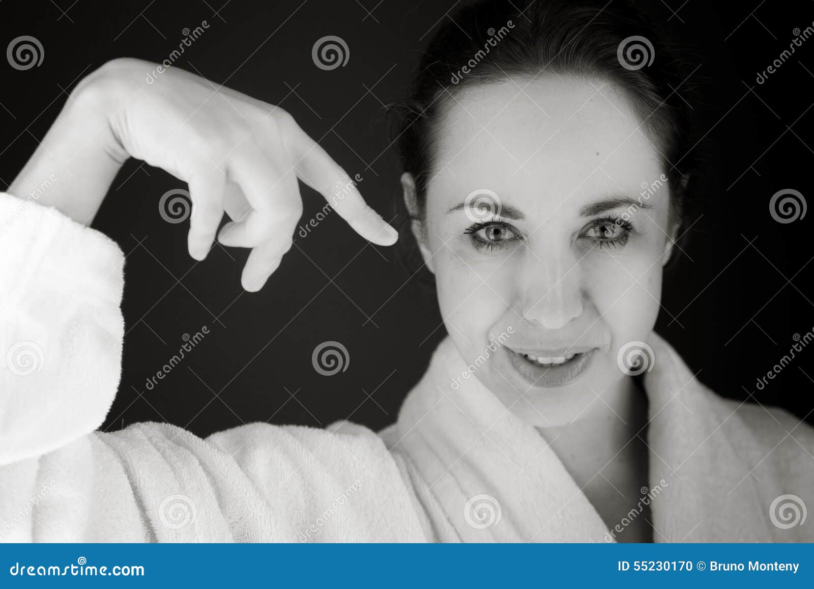 Model Isolated on Plain Background Pointing To Stock Photo - Image of ...