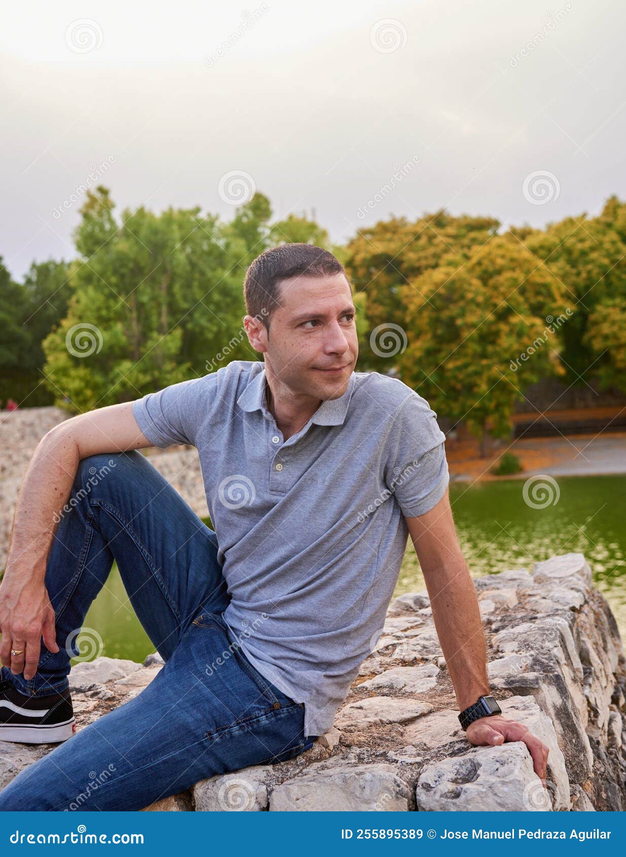 A Model in Jeans Posing Relaxed Stock Image - Image of nature, relax ...