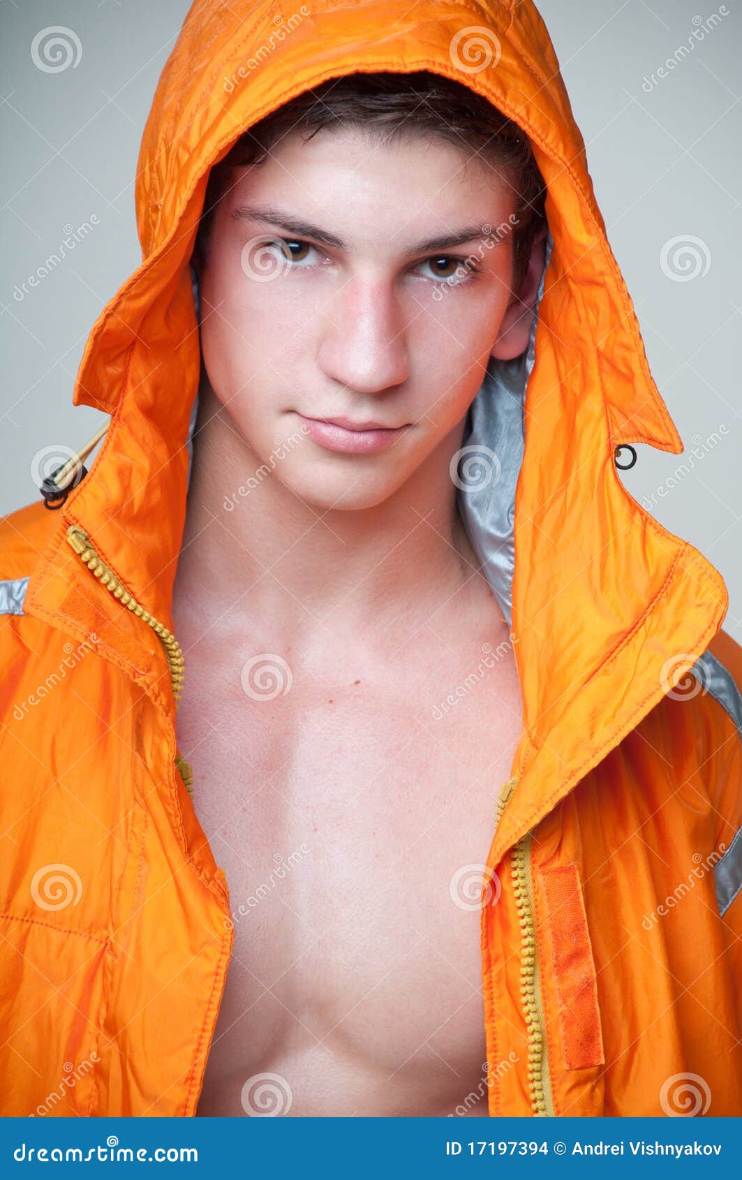 Model in orange stock photo. Image of macho, strength - 17197394