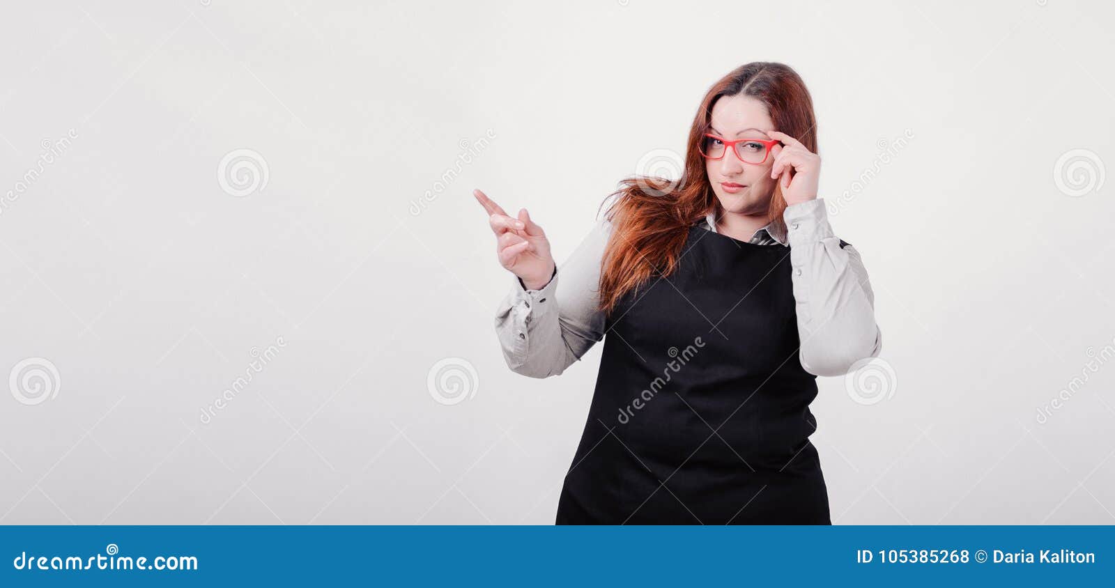 Model Pointing on the Left and Looking on Something Stock Photo - Image ...
