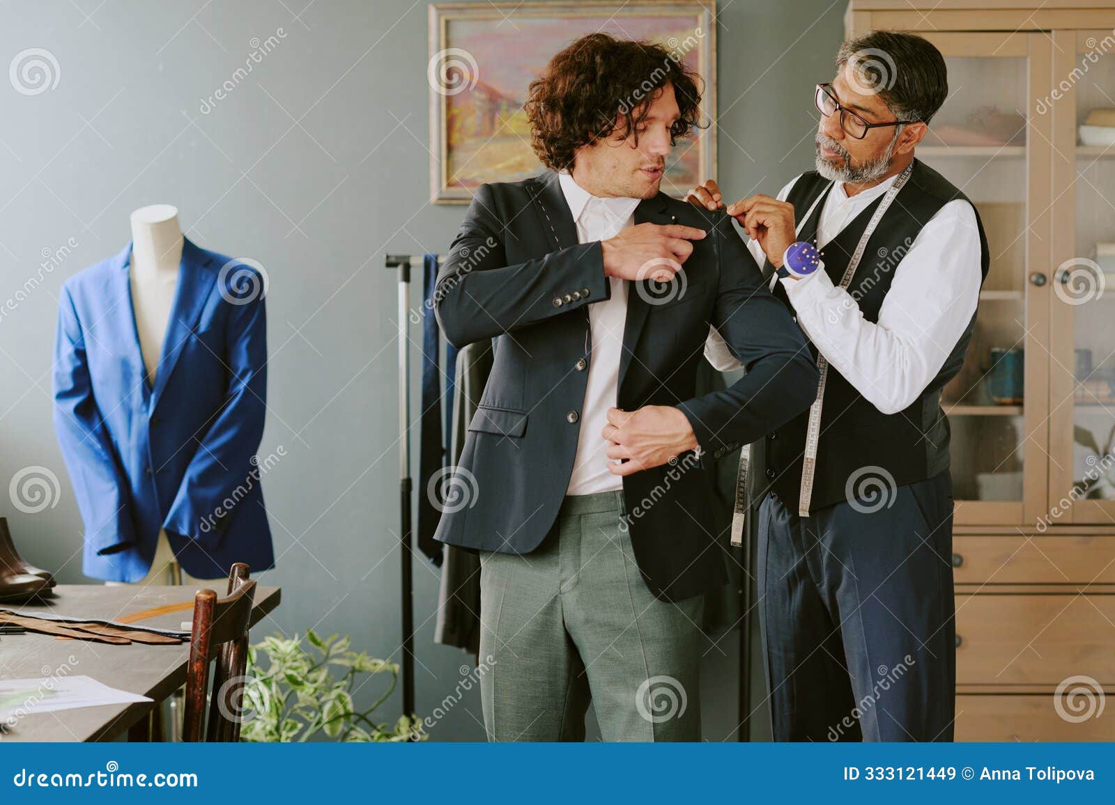 Model Pointing on Shoulder during Fitting Stock Image - Image of ...