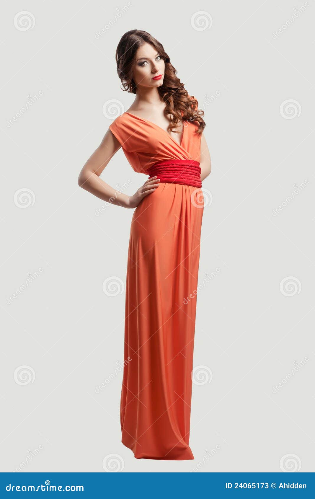 Model Posing in Orange Dress Stock Image - Image of stiletto, slim ...