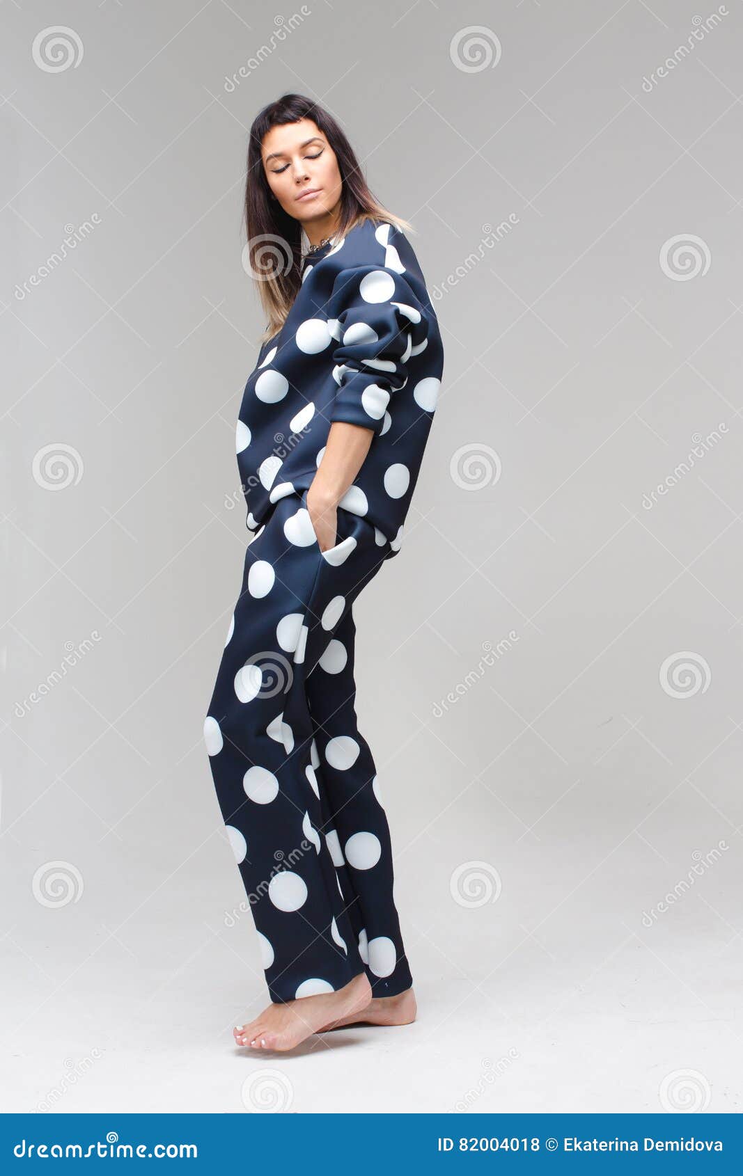 Model Posing in a Polka Dot Costume Pajamas Stock Photo - Image of ...