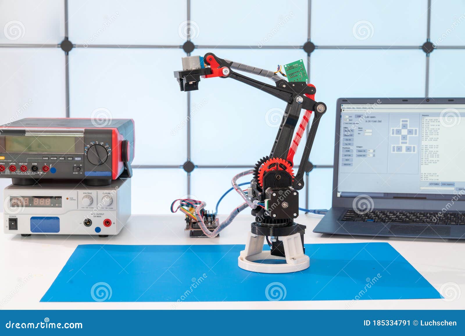 Model of a Robot and a Laptop on a Table in a Design Office Stock Image ...