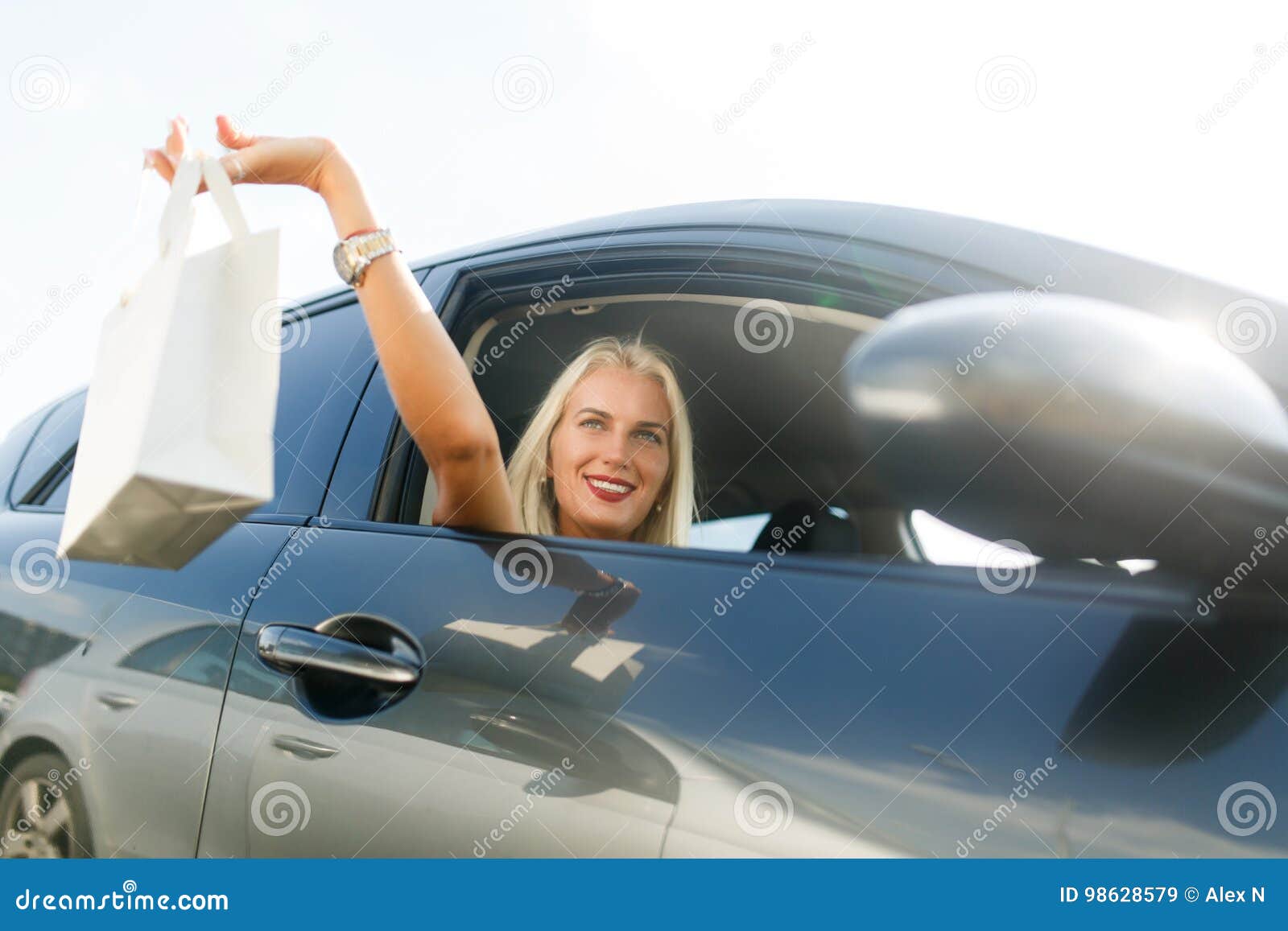 Model with shopping in car stock image. Image of fashion - 98628579