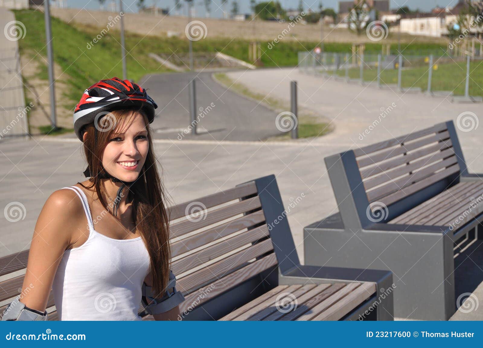 Model sitting on a bench stock photo. Image of sportswear - 23217600