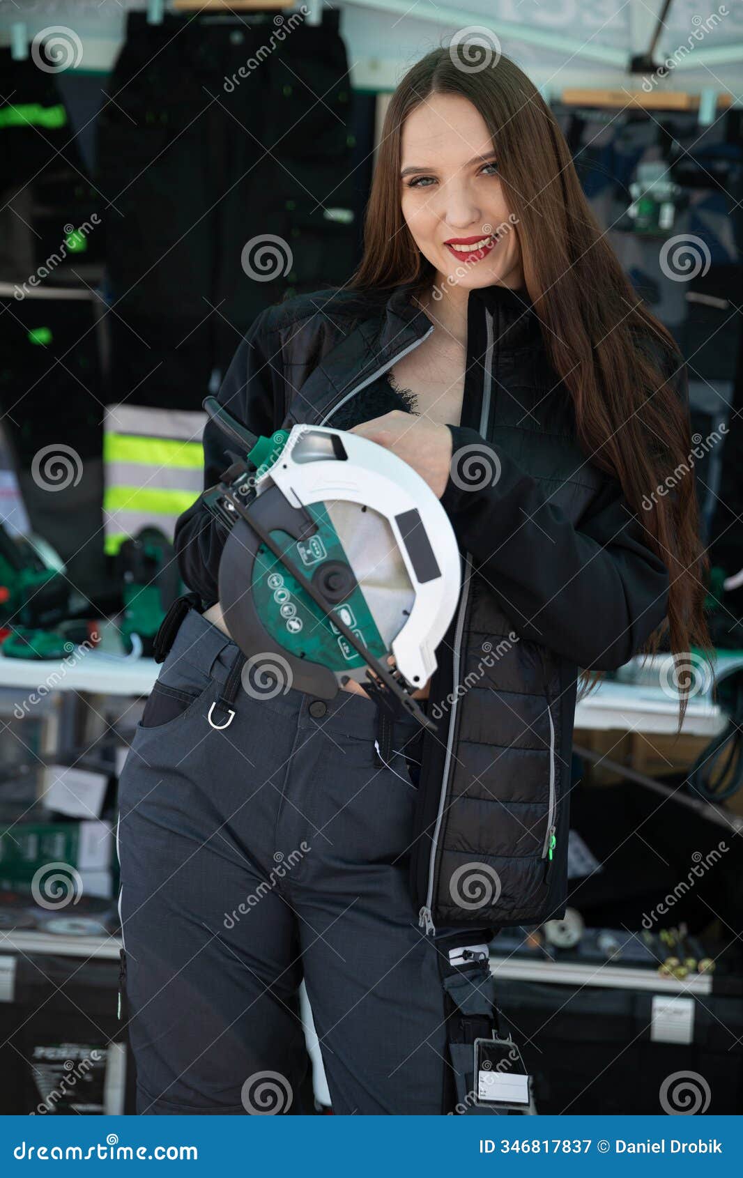 A Model Skillfully Showcasing Workwear Accompanied by Various Types of ...