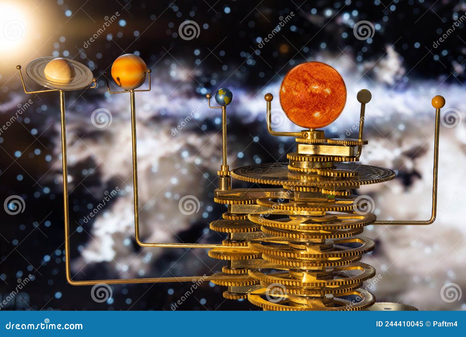 Model of the Solar System Made of Brass Close-up on a Blue Background ...
