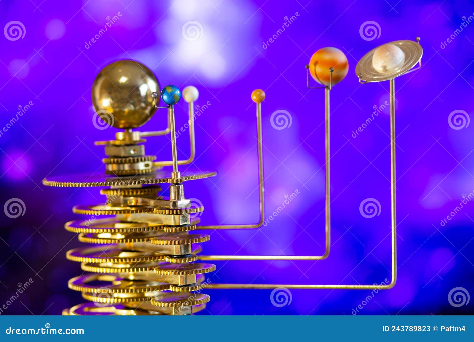 Model of the Solar System Made of Brass Close-up on a Blue Background ...