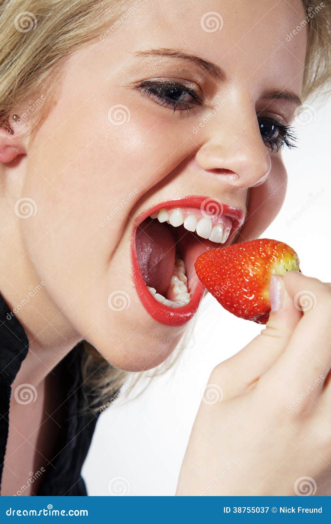 Model with strawberry stock image. Image of bite, diet - 38755037
