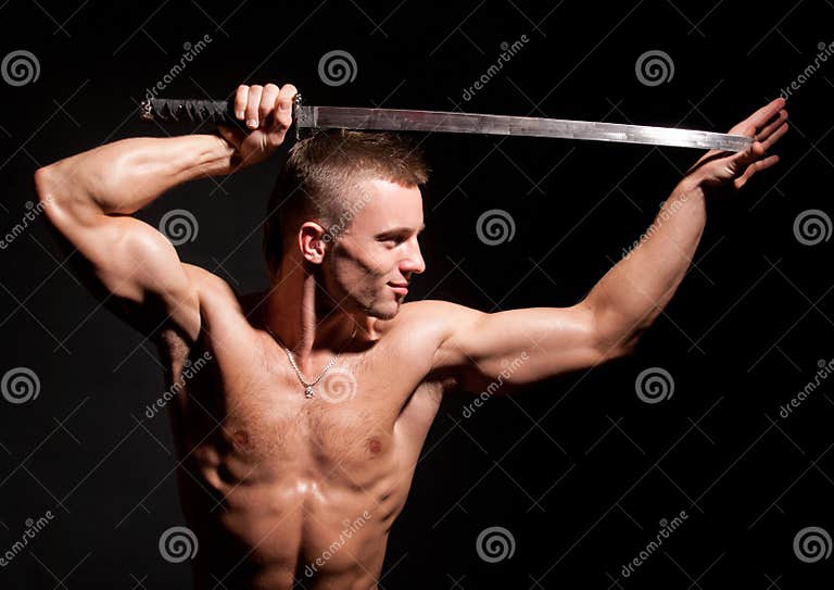 Model with sword stock photo. Image of athlete, strength - 20252614
